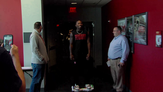 Nebraska QB Tommy Armstrong shows off his hoverboard