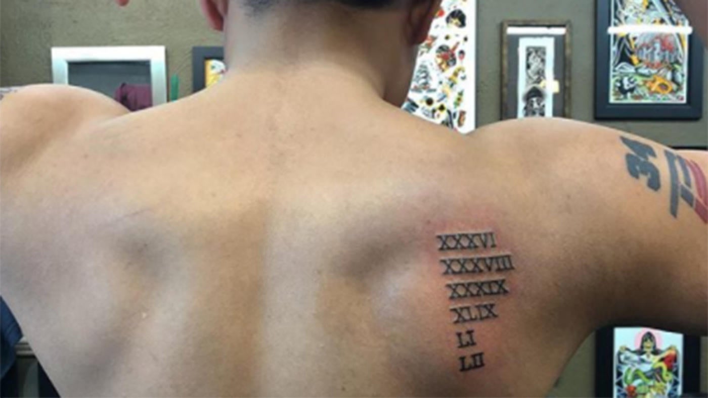 Xlix Tattoos