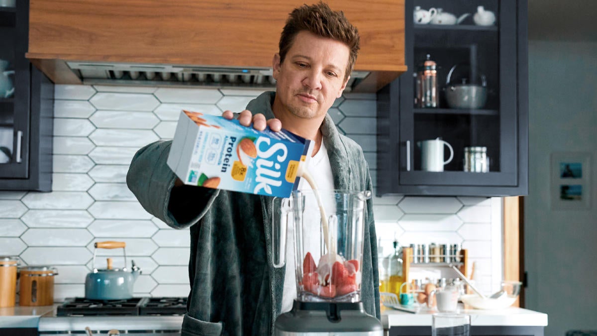 Jeremy Renner Talks Starring in First-Ever Silk Super Bowl Commercial