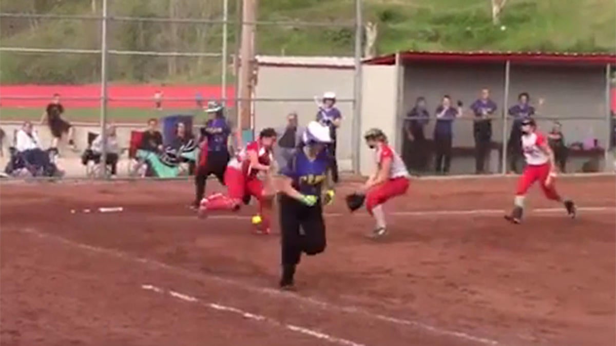 WATCH: Absolute chaos ensues after softball player hits a simple pop-up ...