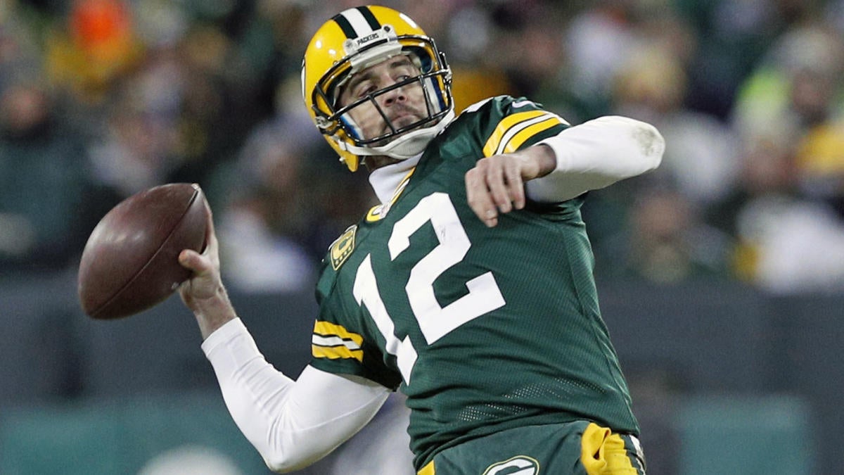 NFL Wild-Card Playoffs: Aaron Rodgers' Hail Mary sparks Packers in win ...