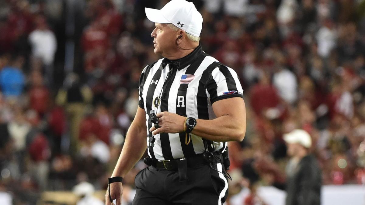 National championship ref wears XXL shirt, says targeting calls have ...