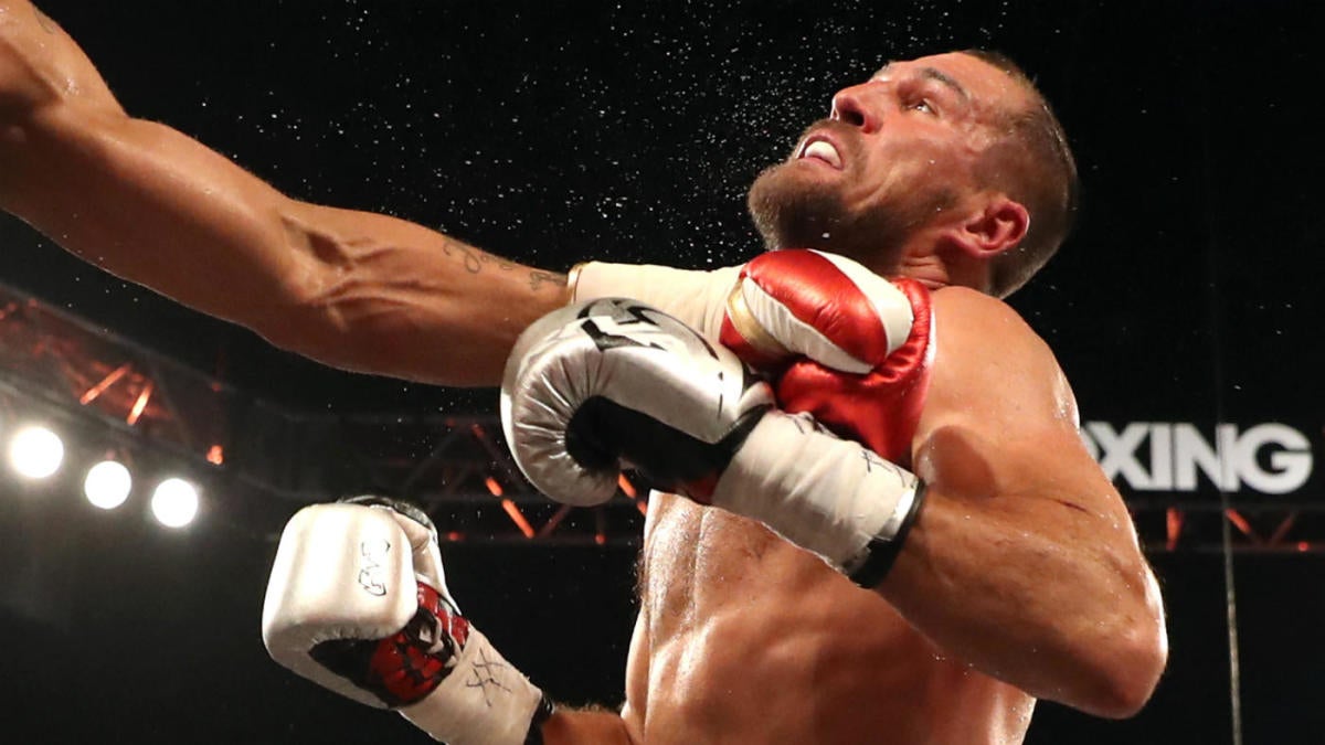 Sergey Kovalev claims low blows led to early TKO stoppage against Andre ...