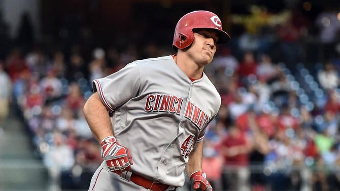 WATCH: Reds' Scott Schebler climbs the wall to steal homer from Brewers ...