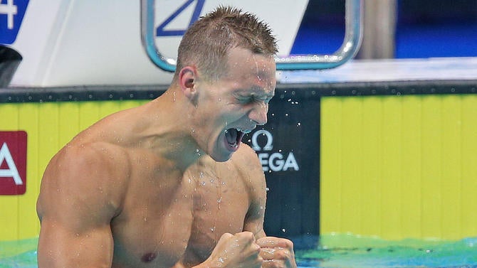 Caeleb Dressel ties Michael Phelps with seven gold medals at world ...