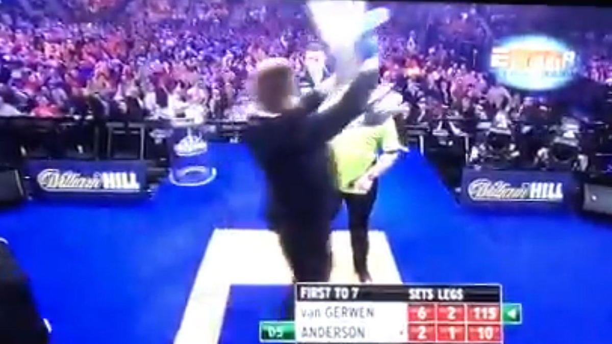 WATCH: Fan rushes stage to steal darts trophy, gets swarmed by security ...