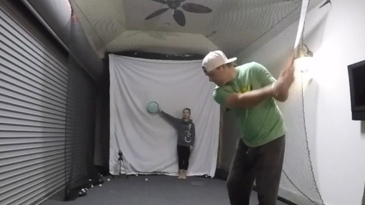 WATCH: This indoor trick shot requires a monumental amount trust from ...