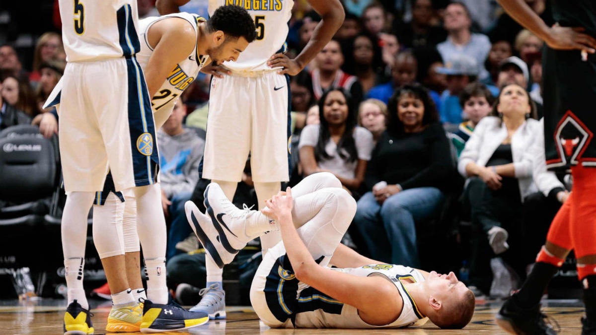Report: Nikola Jokic to miss multiple games, but MRI on injured ankle ...