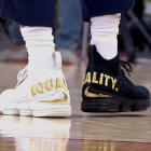 LeBron sends message with mismatched black and white 'Equality' shoes ...