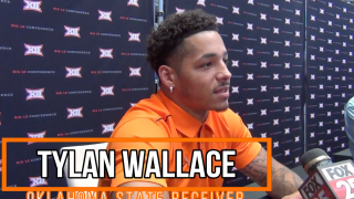 Tylan Wallace and center Johnny Wilson hits on QB play