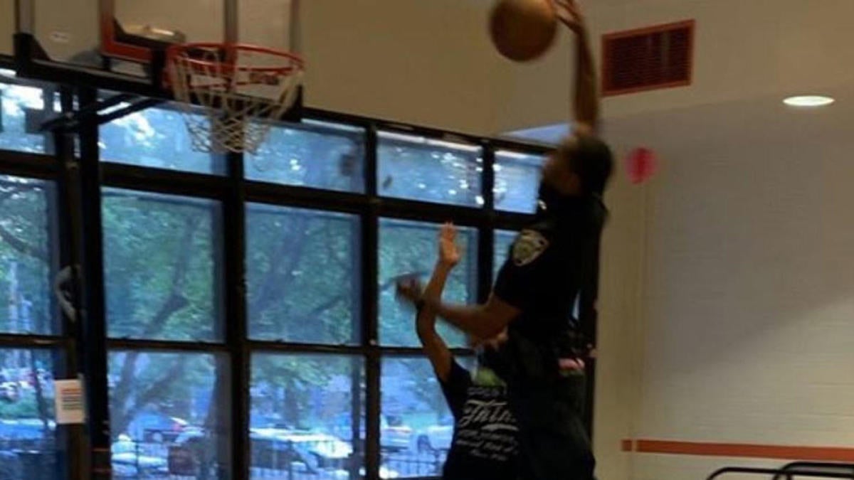 New York City police officer pulls off crazy crossover and dunk in ...