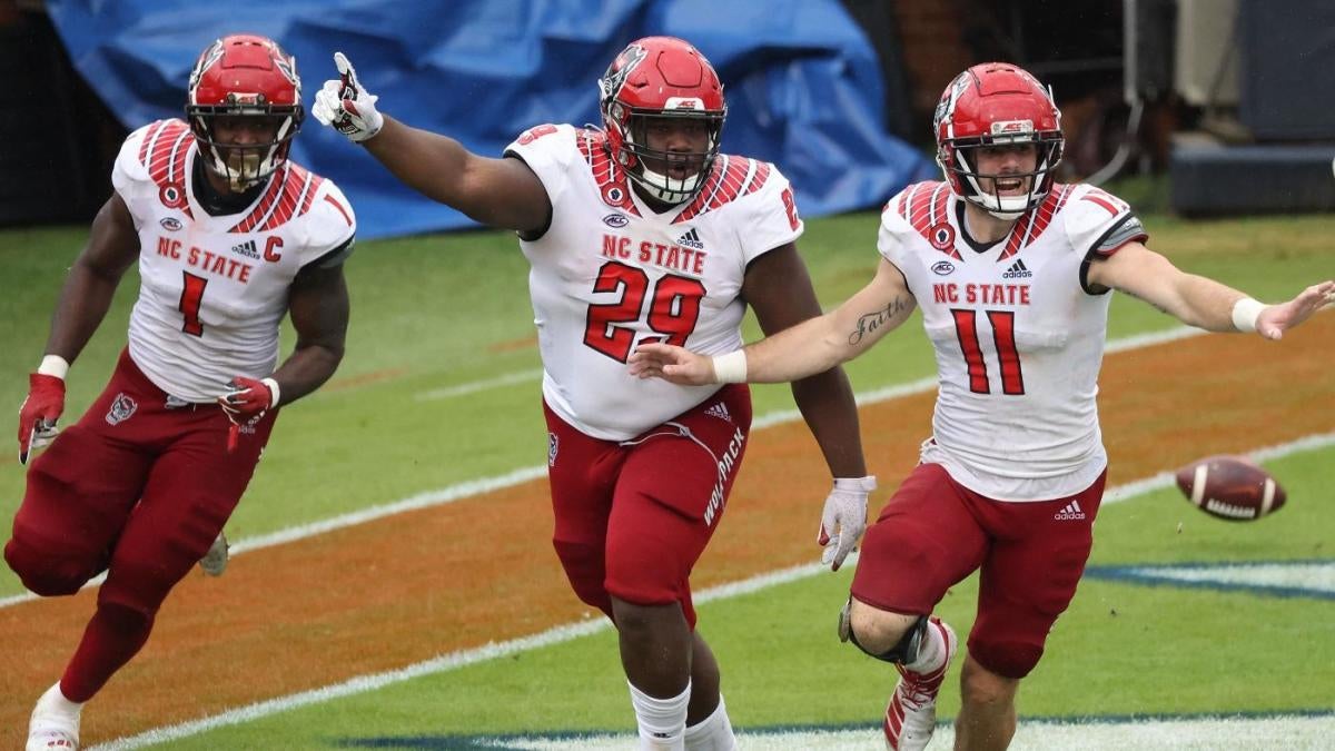 WATCH: NC State's 320 pound defensive tackle rumbles for 18-yard pick ...