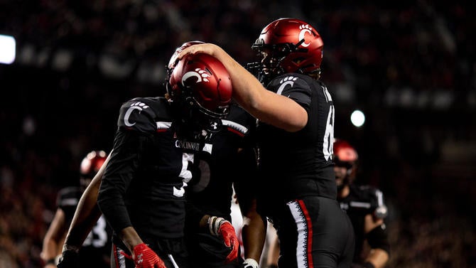 Cincinnati makes history in latest CFP rankings, plus No. 1 Gonzaga ...