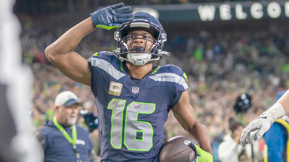 Seahawks' Tyler Lockett agrees to restructured deal, helps open up ...