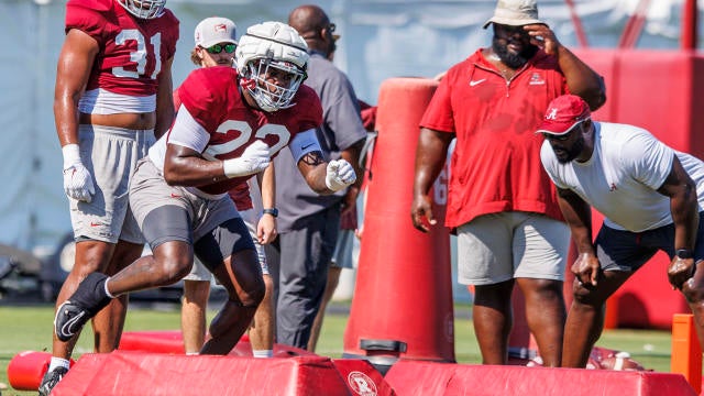 Alabama's defensive line runs through drills during the fourth practice ...