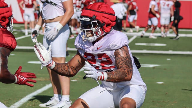 Razorback running backs go through fall drills
