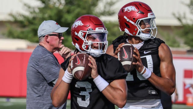 Arkansas quarterbacks and tight ends go through drills