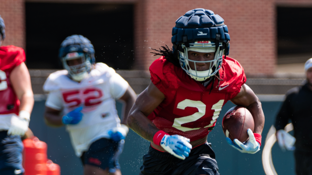 Ole Miss running backs going through practice drills