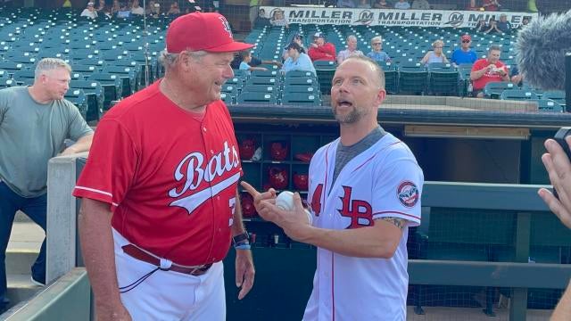 Pat Kelsey meets Louisville Bats manager Pat Kelly after throwing out ...